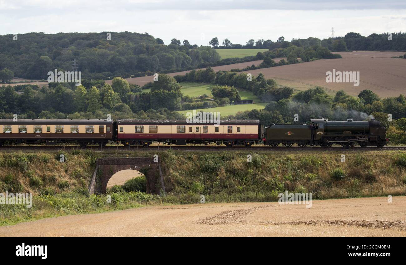 The SR V 'School' class steam locomotive Cheltenham makes its way along ...