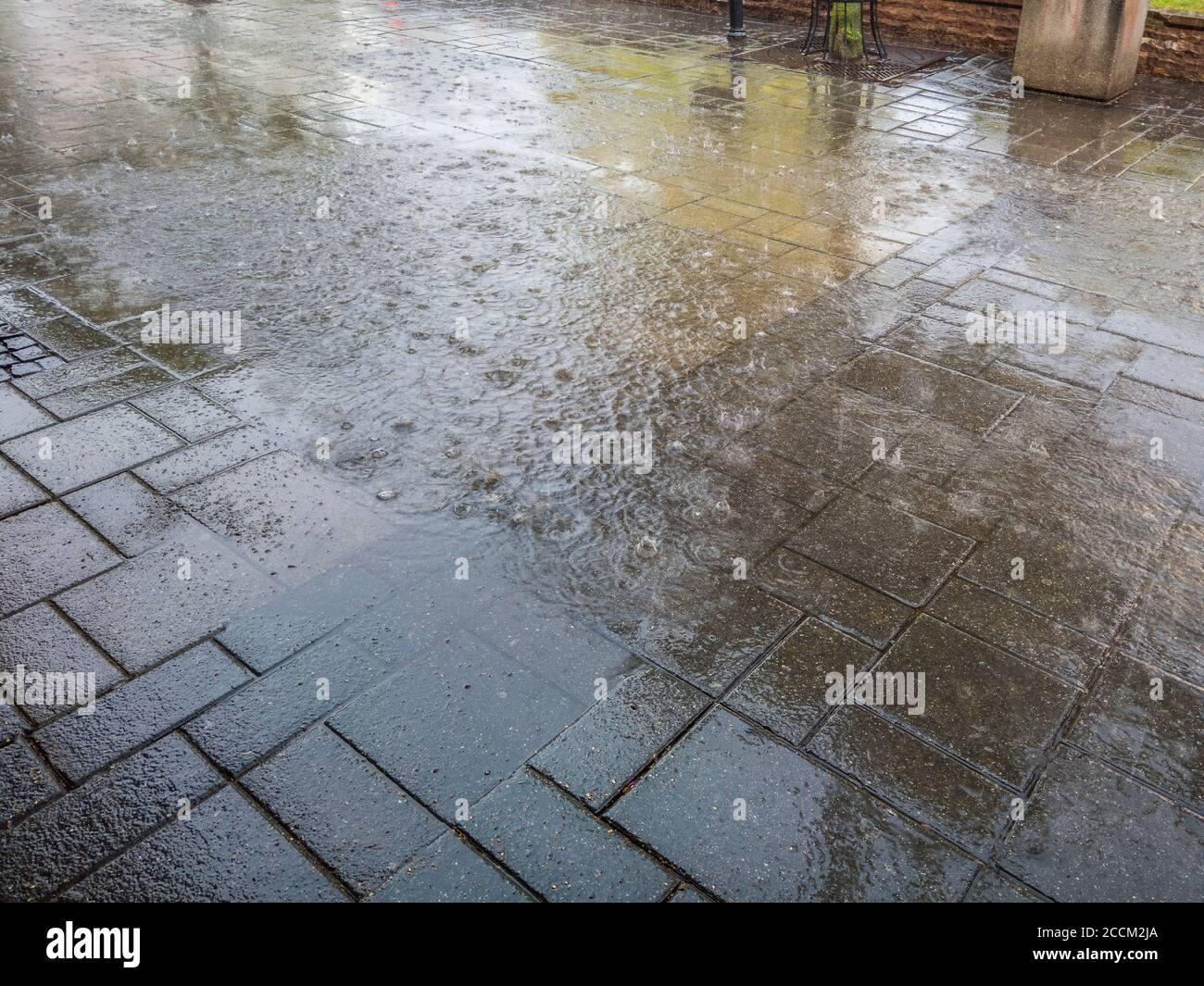 Rain on the sidewalk hi-res stock photography and images - Alamy