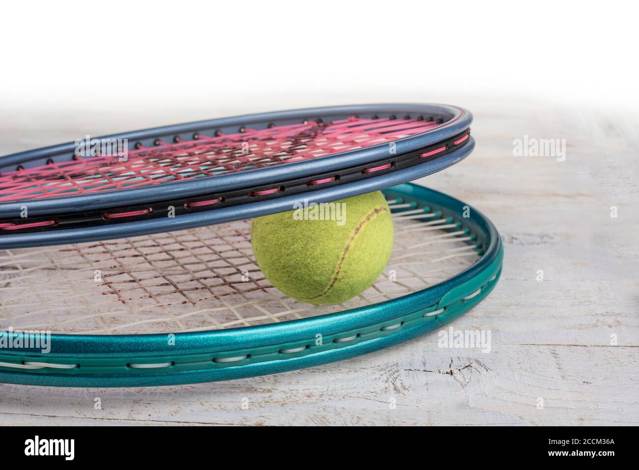 Old Tennis racket and ball on a white background Stock Photo - Alamy