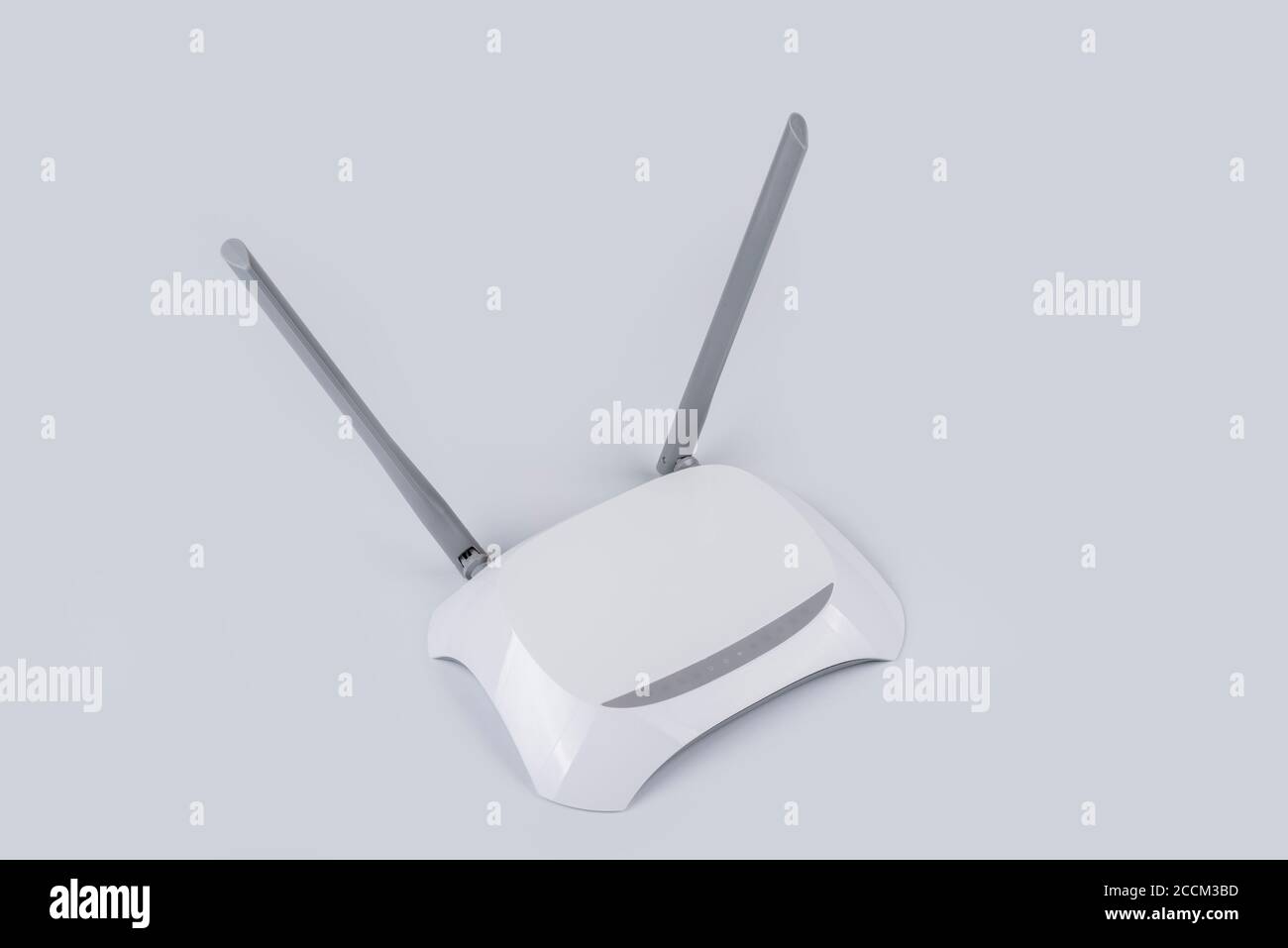 New modern router on a white background Stock Photo - Alamy