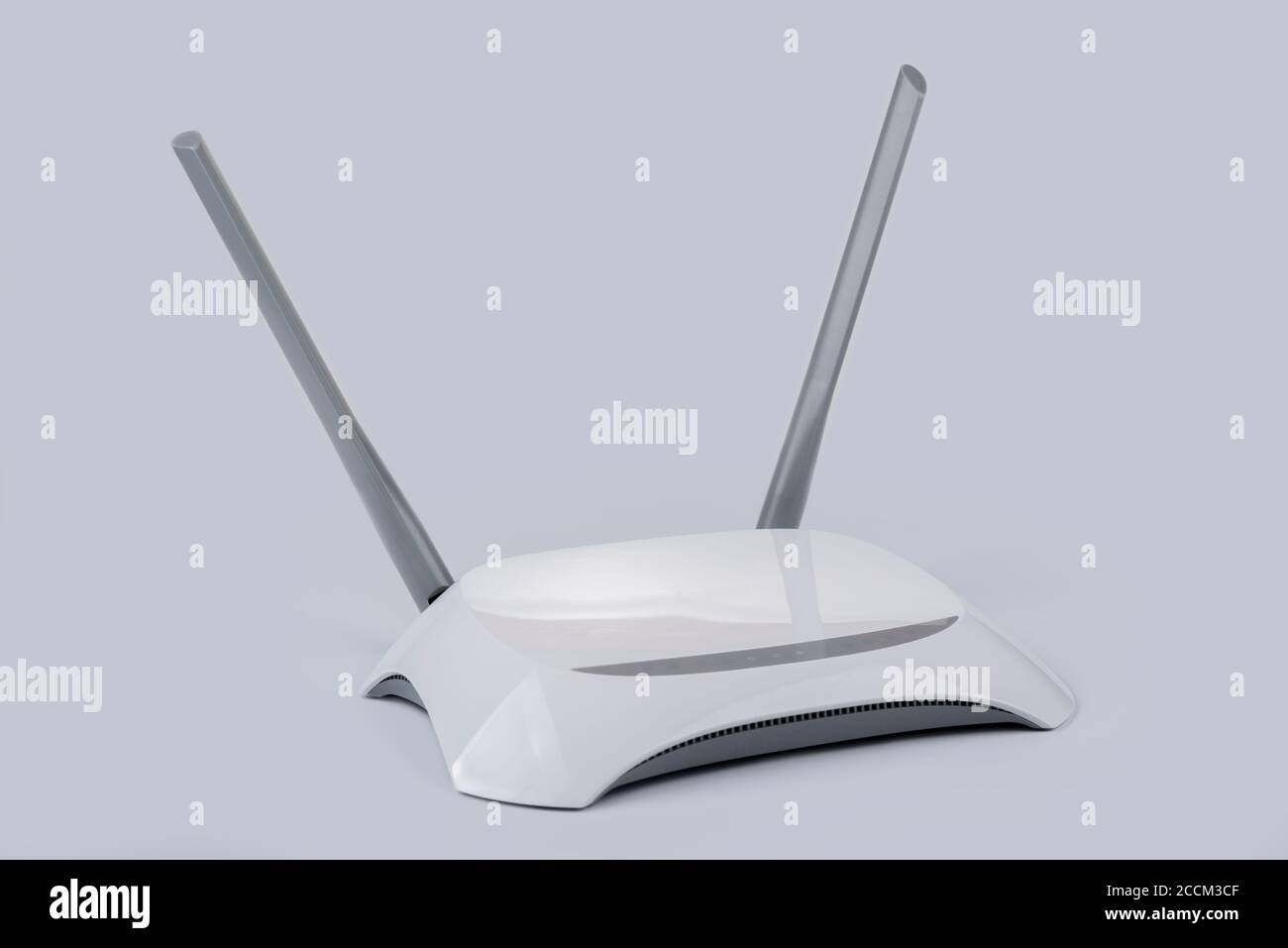 New modern router on a white background Stock Photo - Alamy
