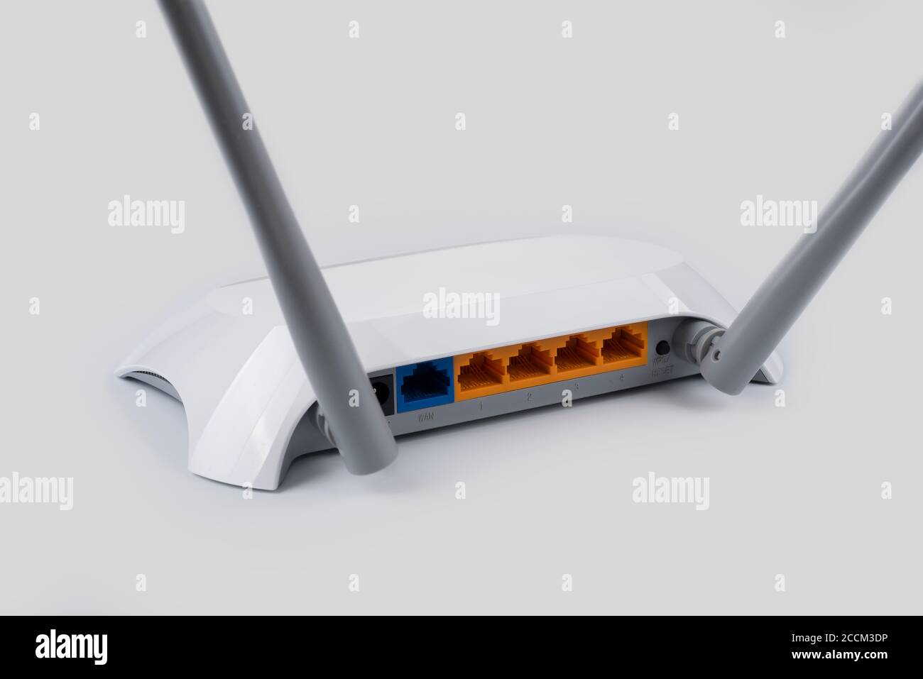 New modern router on a white background Stock Photo - Alamy