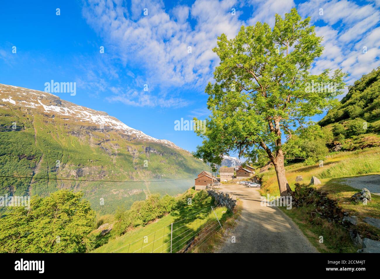 GEIRANGER, NORWAY - 2016 JUNE 13. The narrow road to Westeras farm and ...