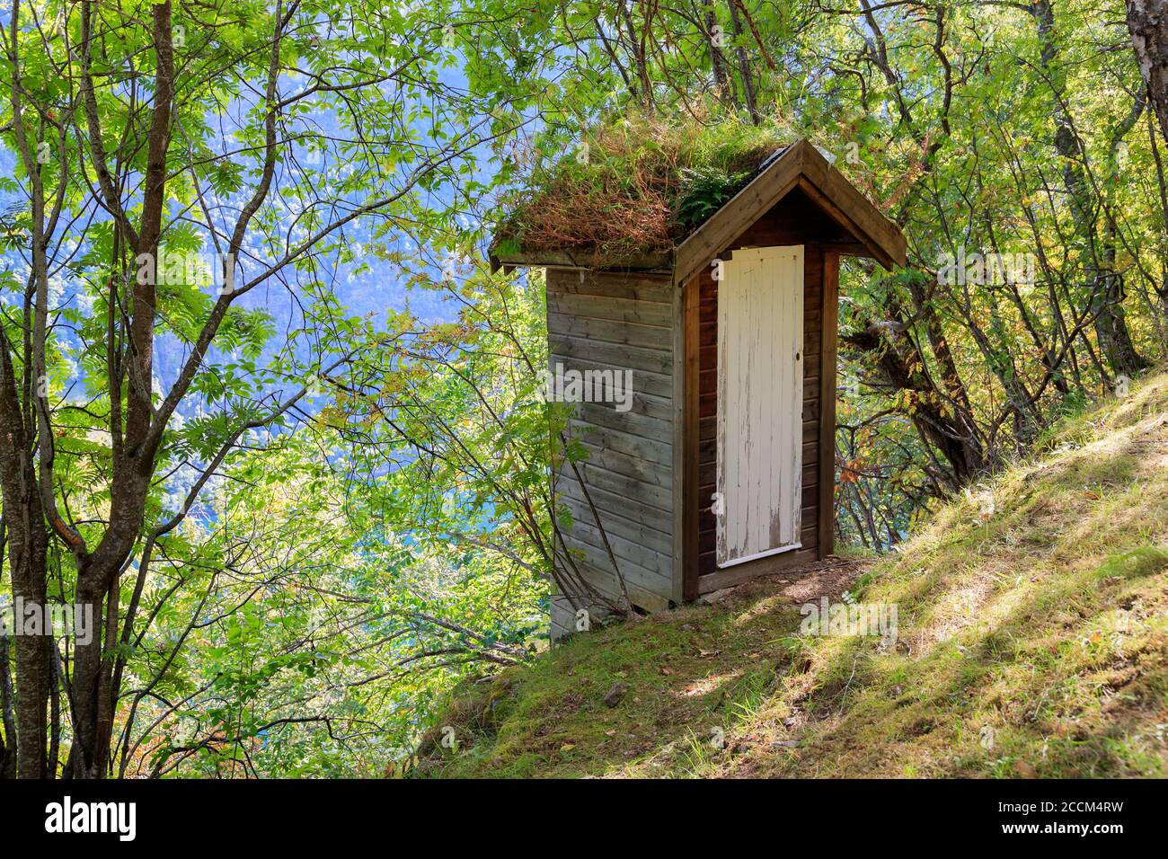 Small outside toilet house in the mountain of Geiranger Stock Photo - Alamy