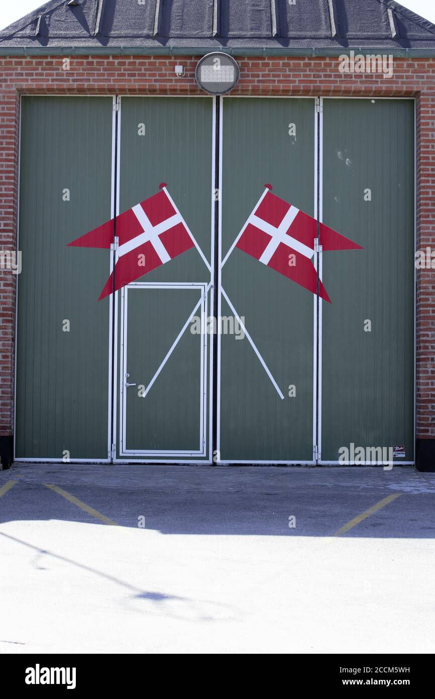 Denmark flags painted on the gate of a building Stock Photo - Alamy
