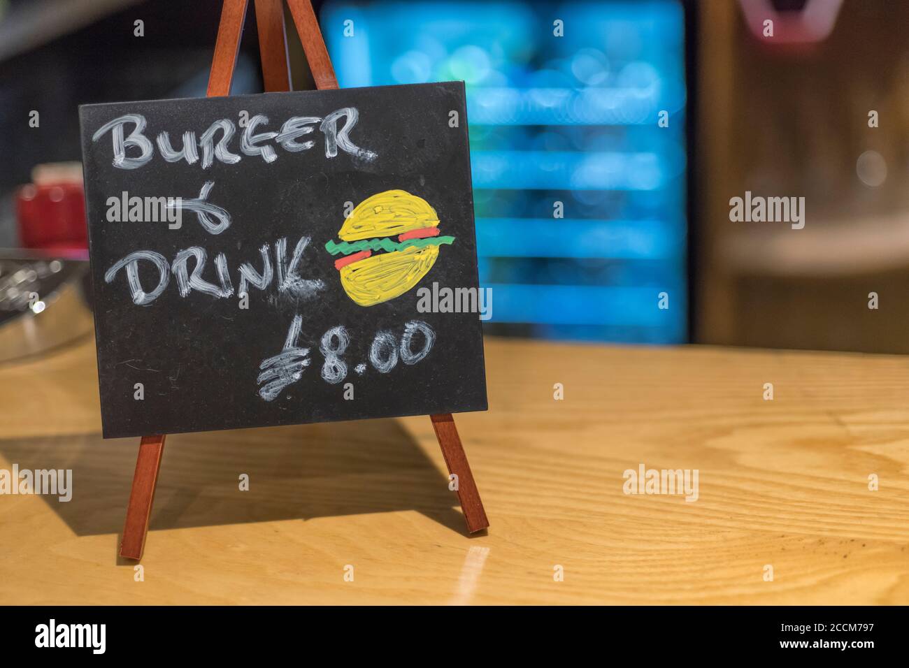 Small miniature A-frame bar top sign advertising a Burger & drink combo ...