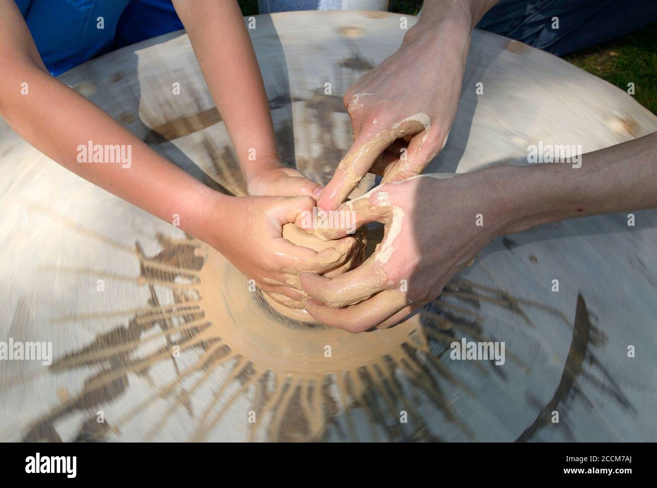 Kid throwing clay hi-res stock photography and images - Alamy