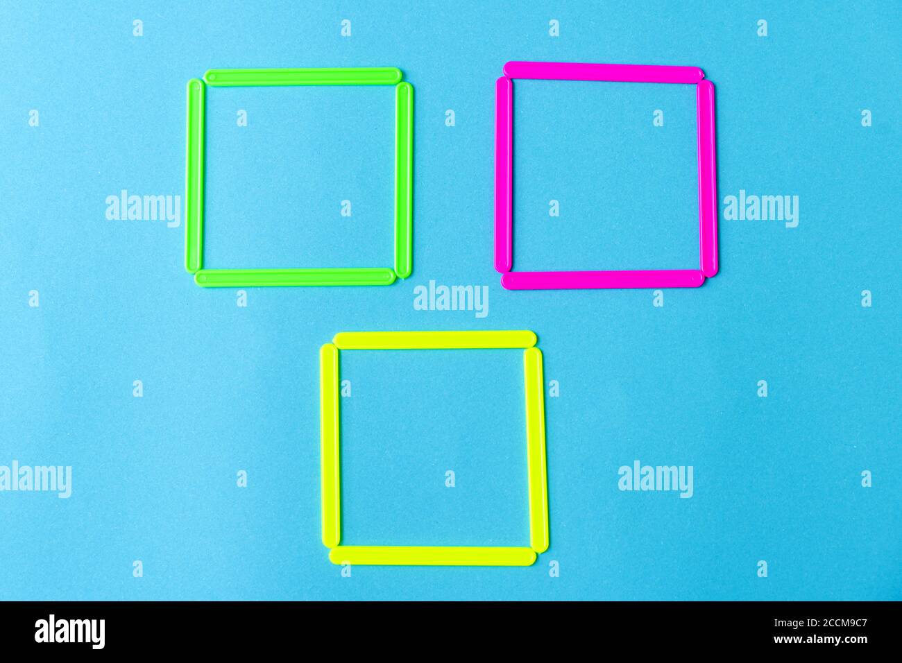 three squares of counting plastic sticks designed for teaching counting ...