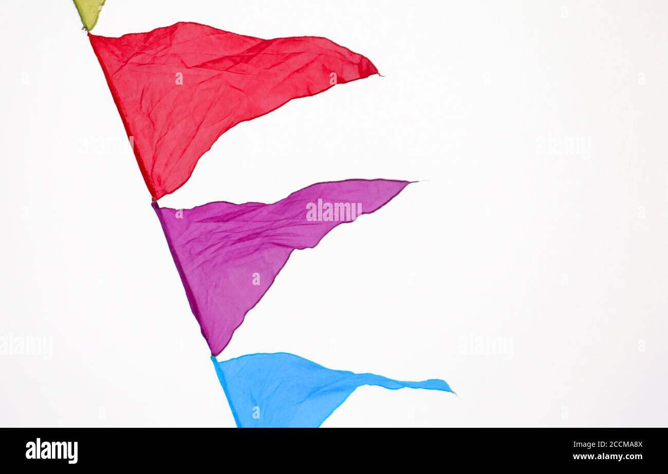 Fairground triangle flag hanging on a rope for a fun party Fiesta event ...