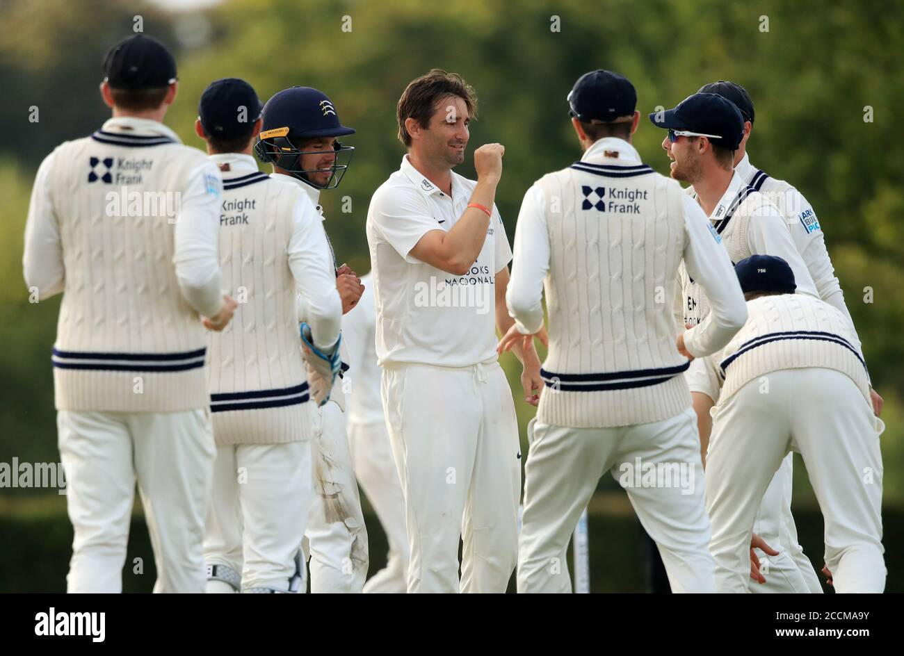 Middlesex's Tim Murtagh (centre) celebrates the wicket of Sussex's ...