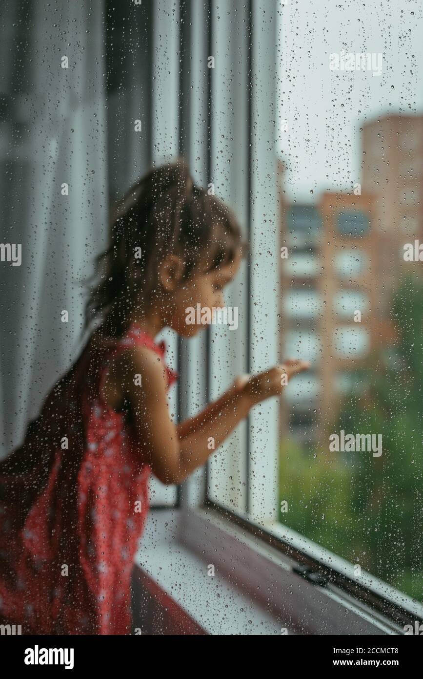 Rainy window children hi-res stock photography and images - Alamy
