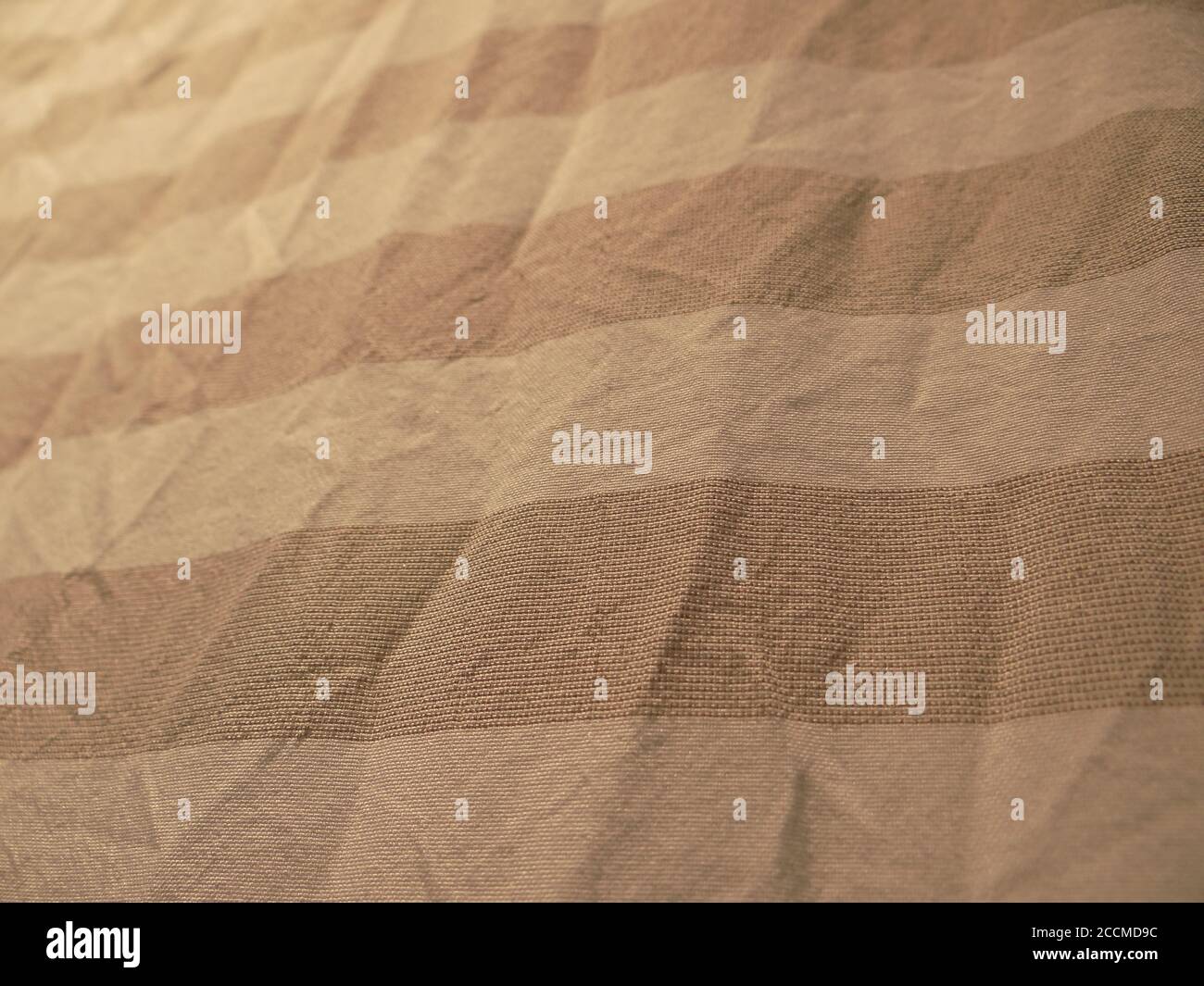 Closeup of beige wrinkled fabric texture for background Stock Photo - Alamy