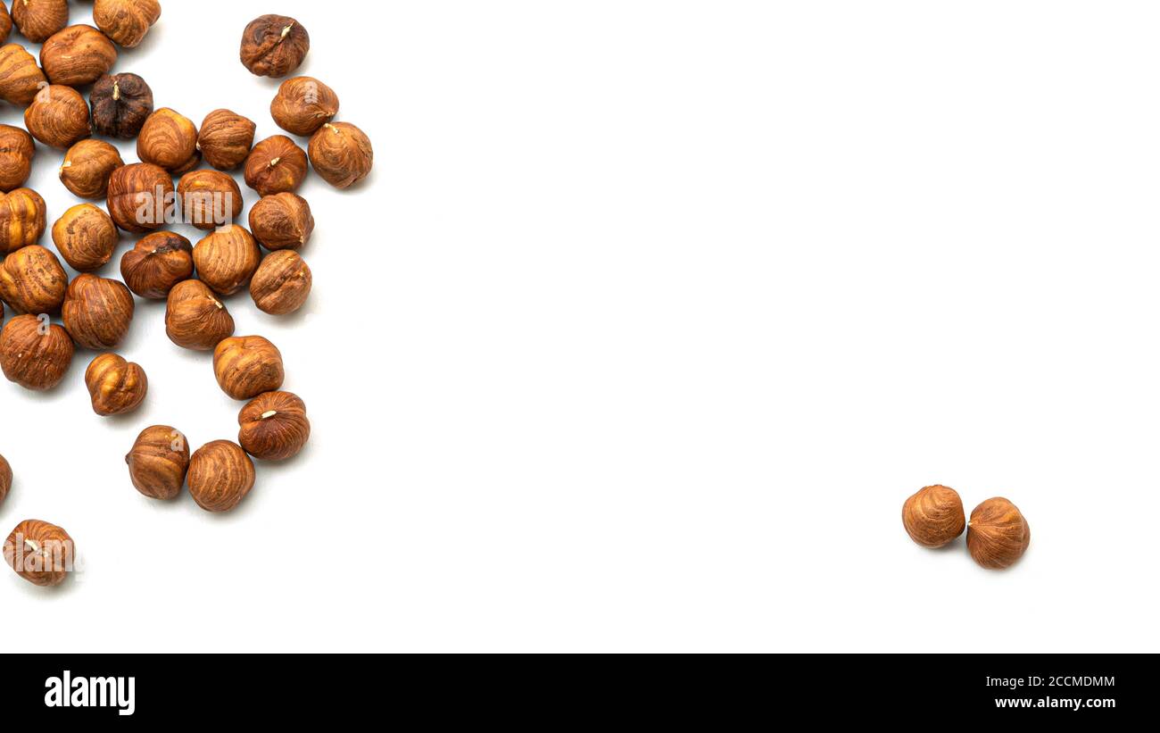 Textured, peeled hazelnut on a white background Stock Photo - Alamy