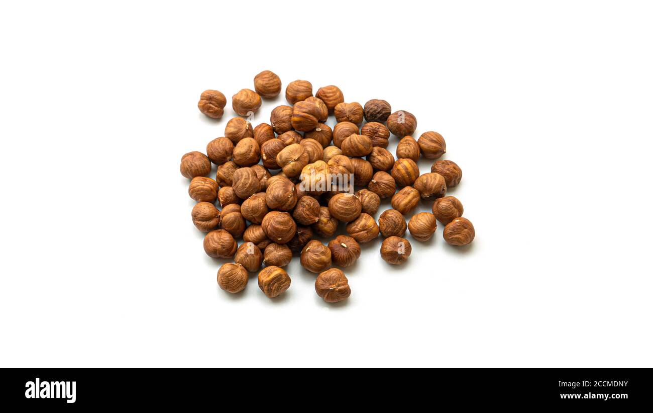 Textured, peeled hazelnut on a white background Stock Photo - Alamy