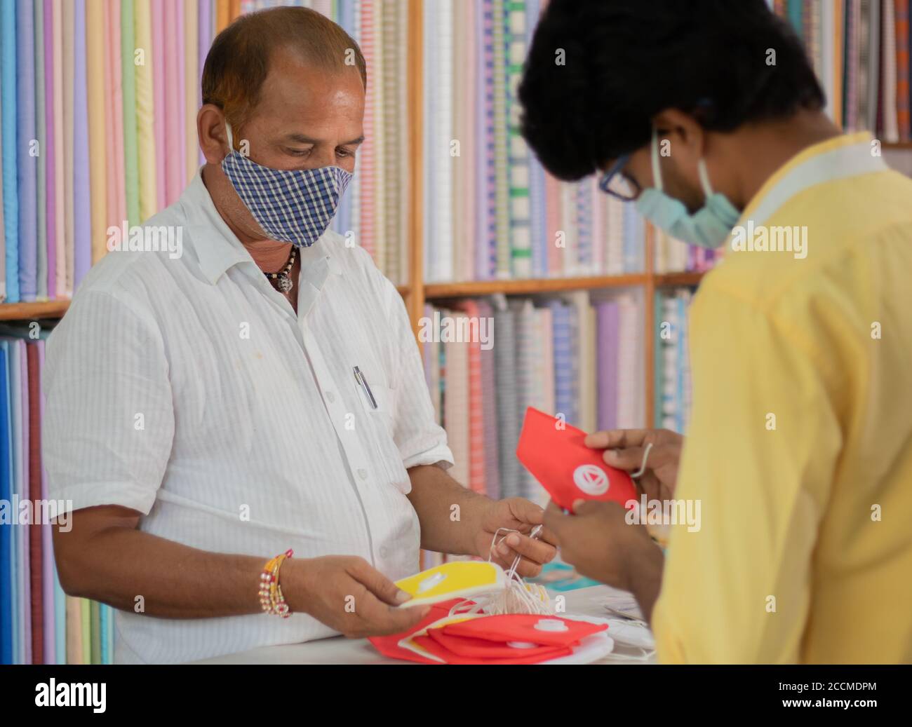 Shopkeeper selling customer hi-res stock photography and images - Alamy