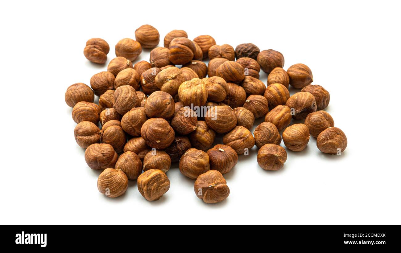 Textured, peeled hazelnut on a white background Stock Photo - Alamy
