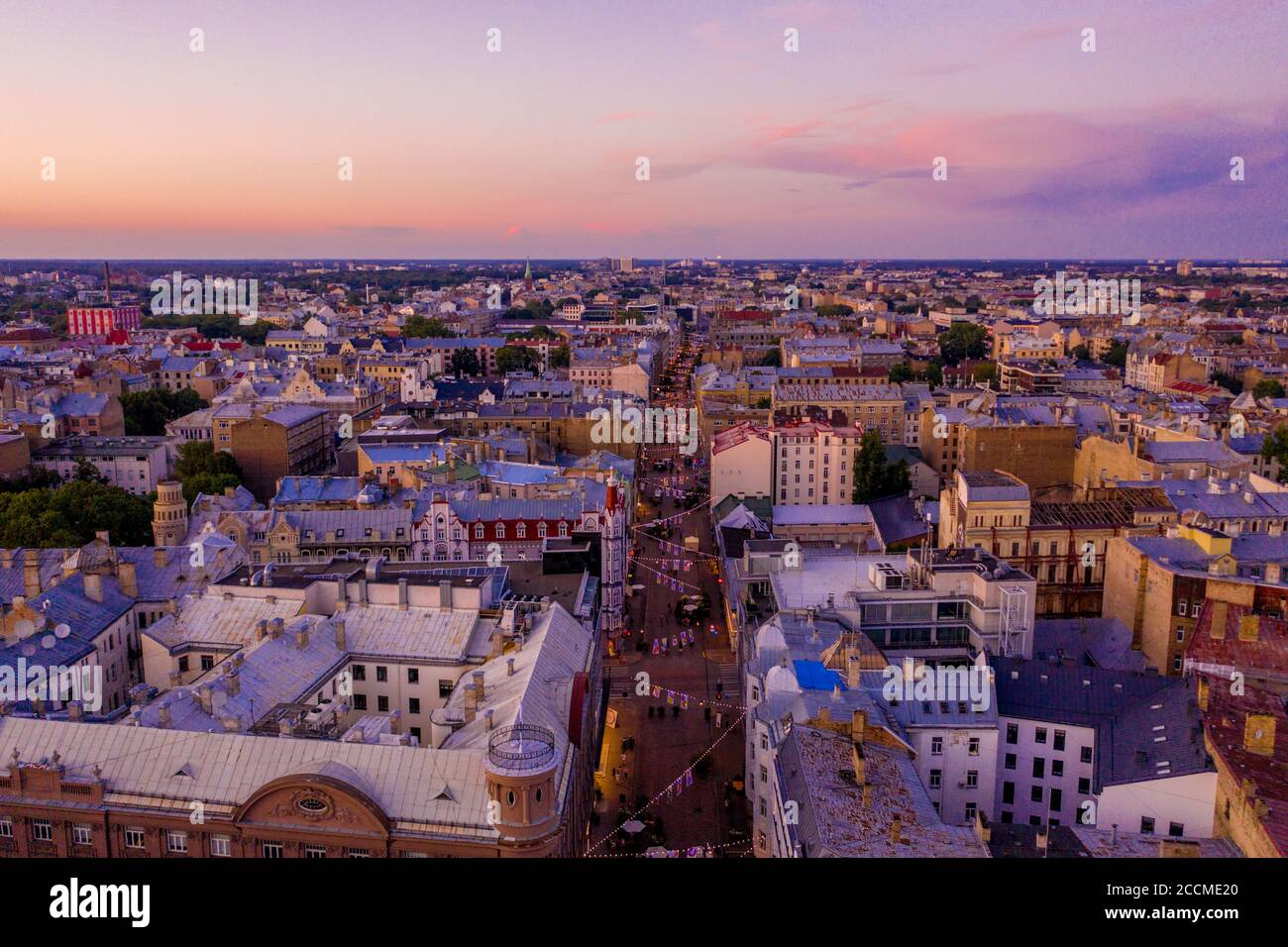 Cityscape of Riga surrounded by buildings and greenery during the ...
