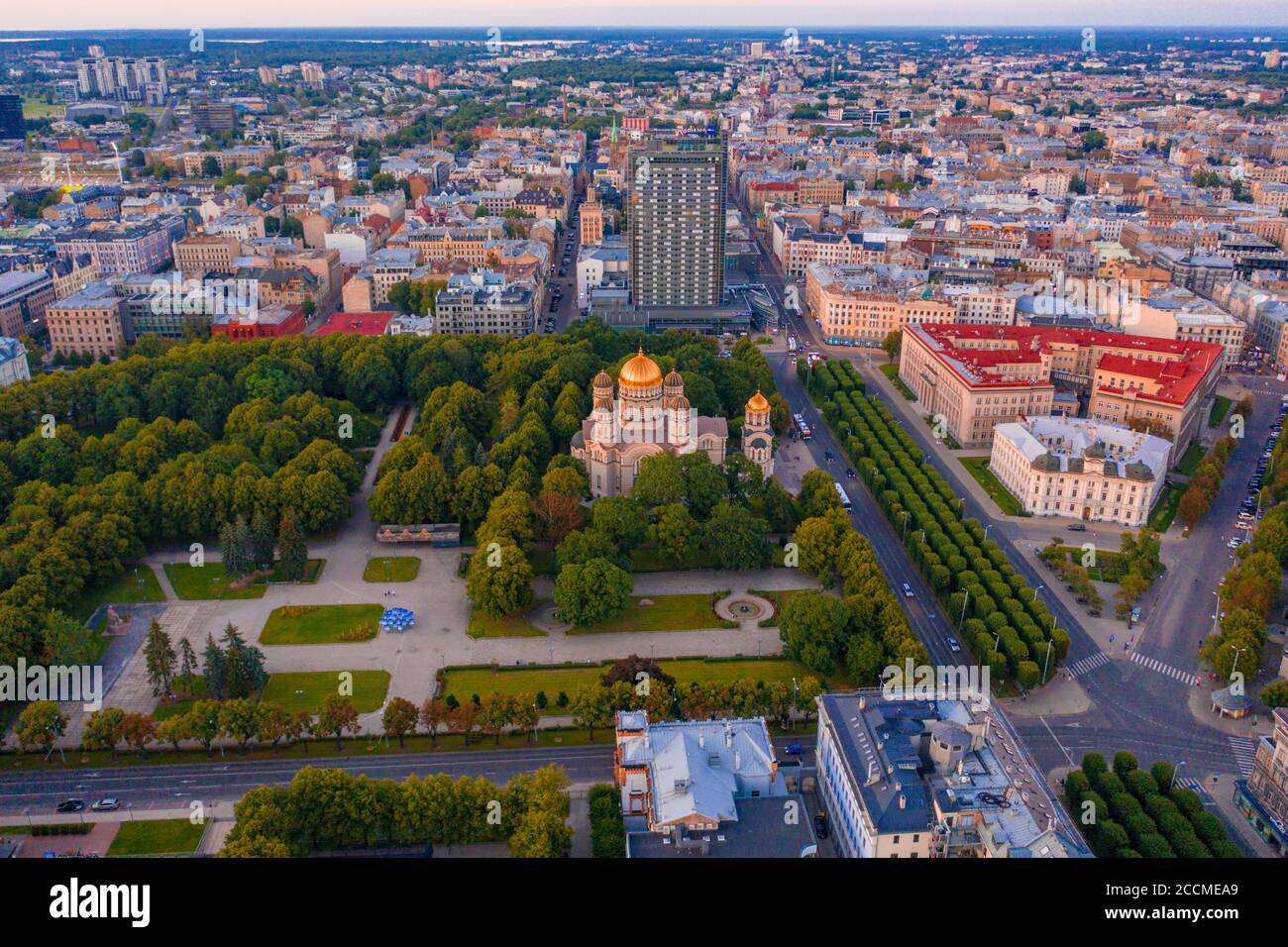 Cityscape of Riga surrounded by buildings and greenery in Latvia Stock ...