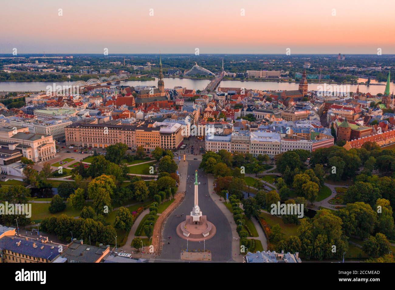 Freedom Square surrounded by buildings and greenery during the sunset ...
