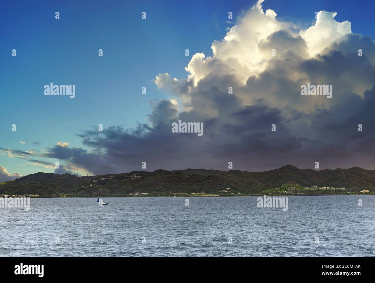 Small japanese fishing boat sailing on the Uraga channel off Tokyo Bay ...