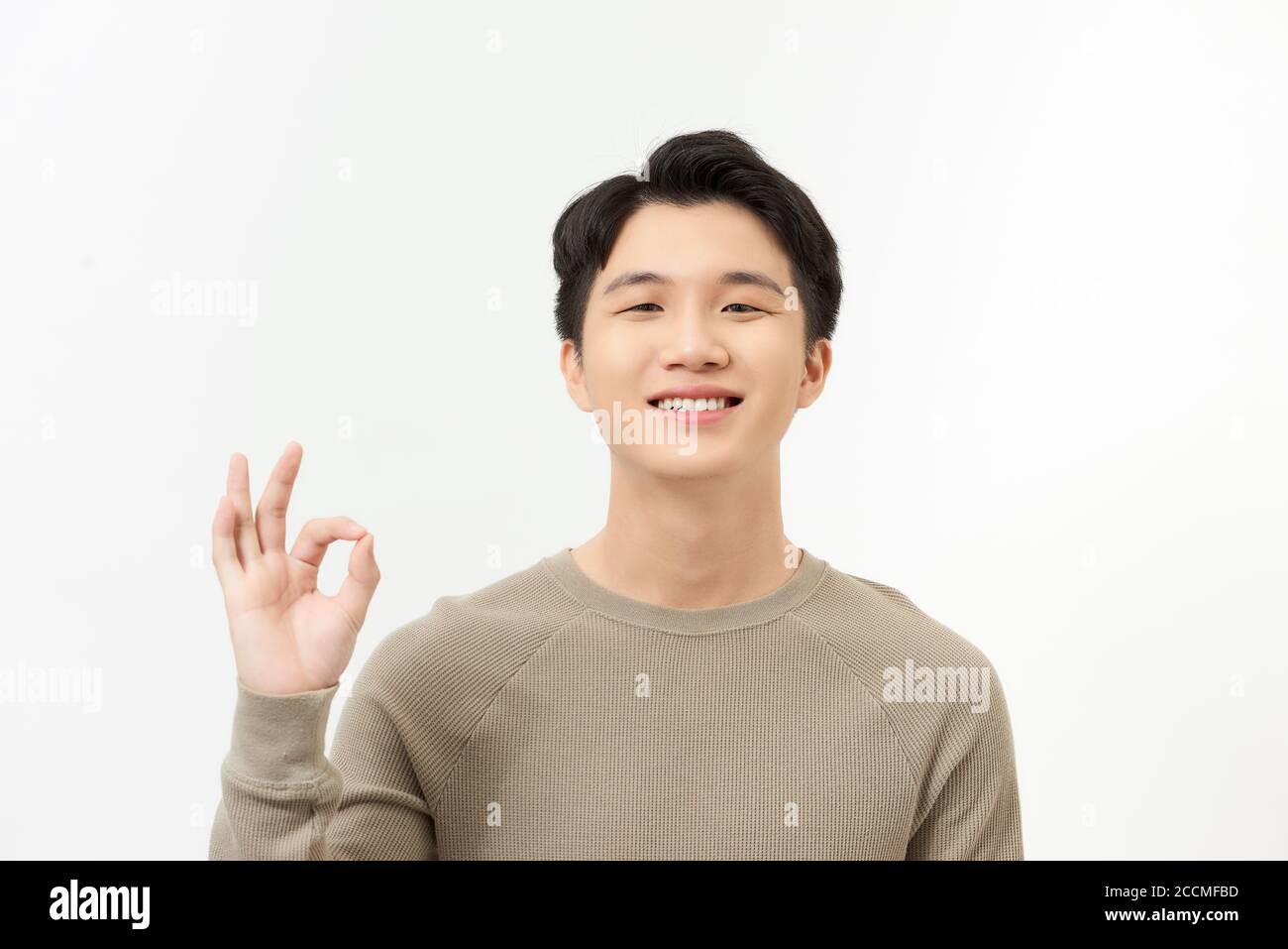 Portrait of happy young asian man dress in casual informal smiling and ...