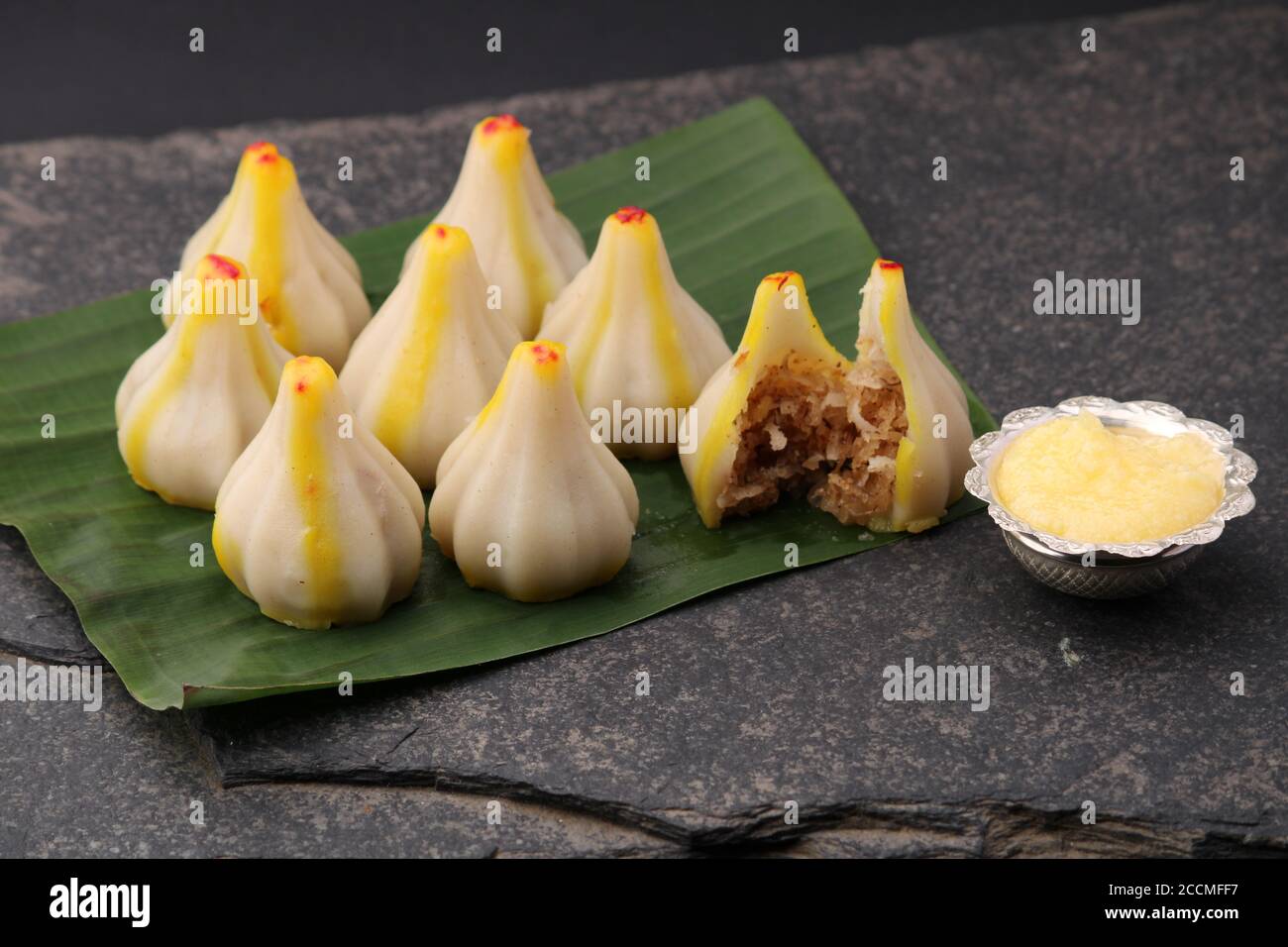 Modak- a traditional dish made on Ganpati festival in India. Served ...