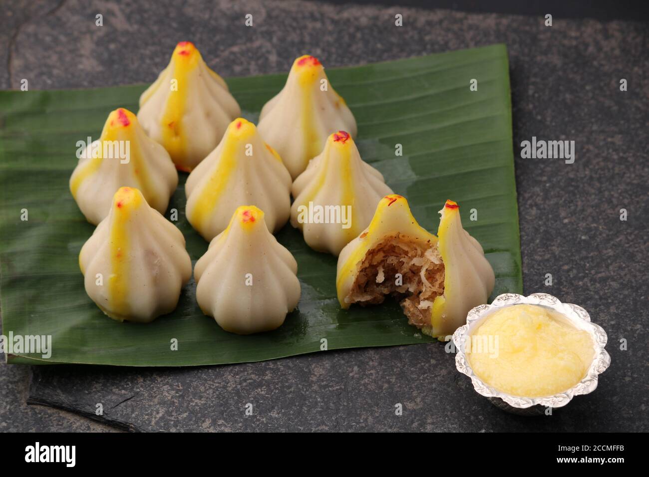 Modak- a traditional dish made on Ganpati festival in India. Served ...