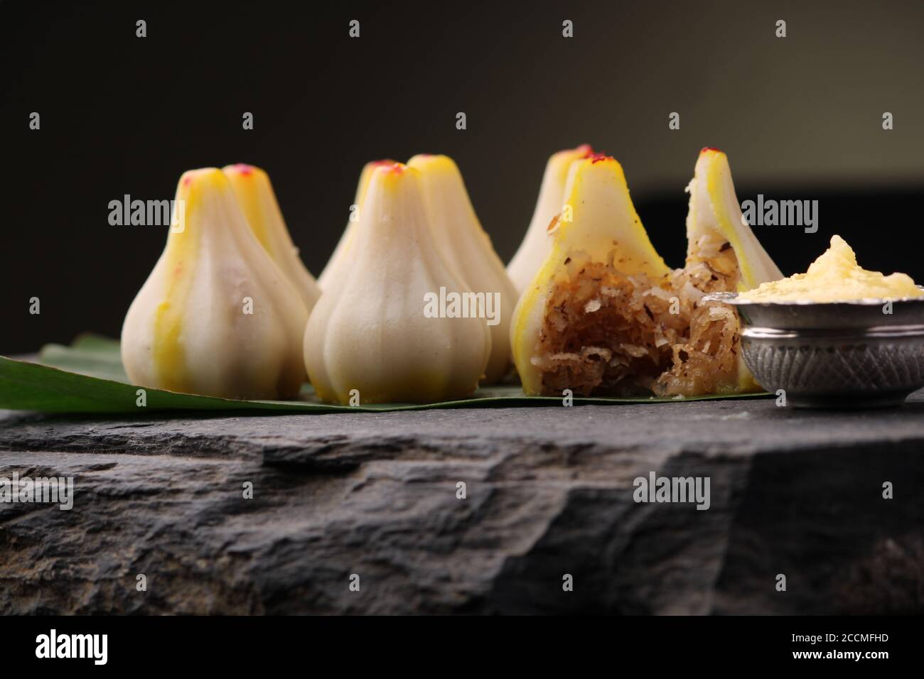 Modak- a traditional dish made on Ganpati festival in India. Served ...
