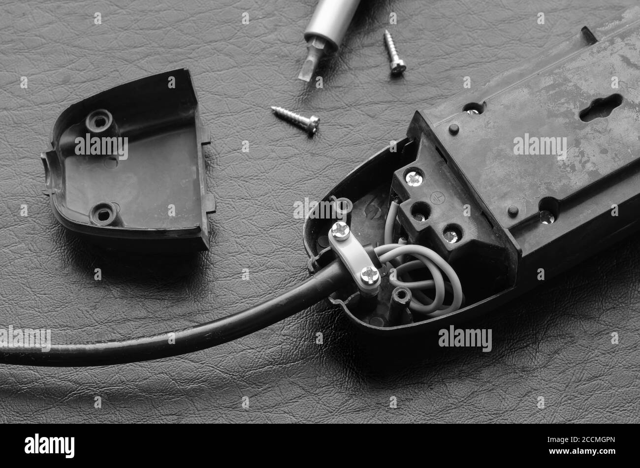 Electric splitter, cable and screwdriver. Connecting wiring to the ...