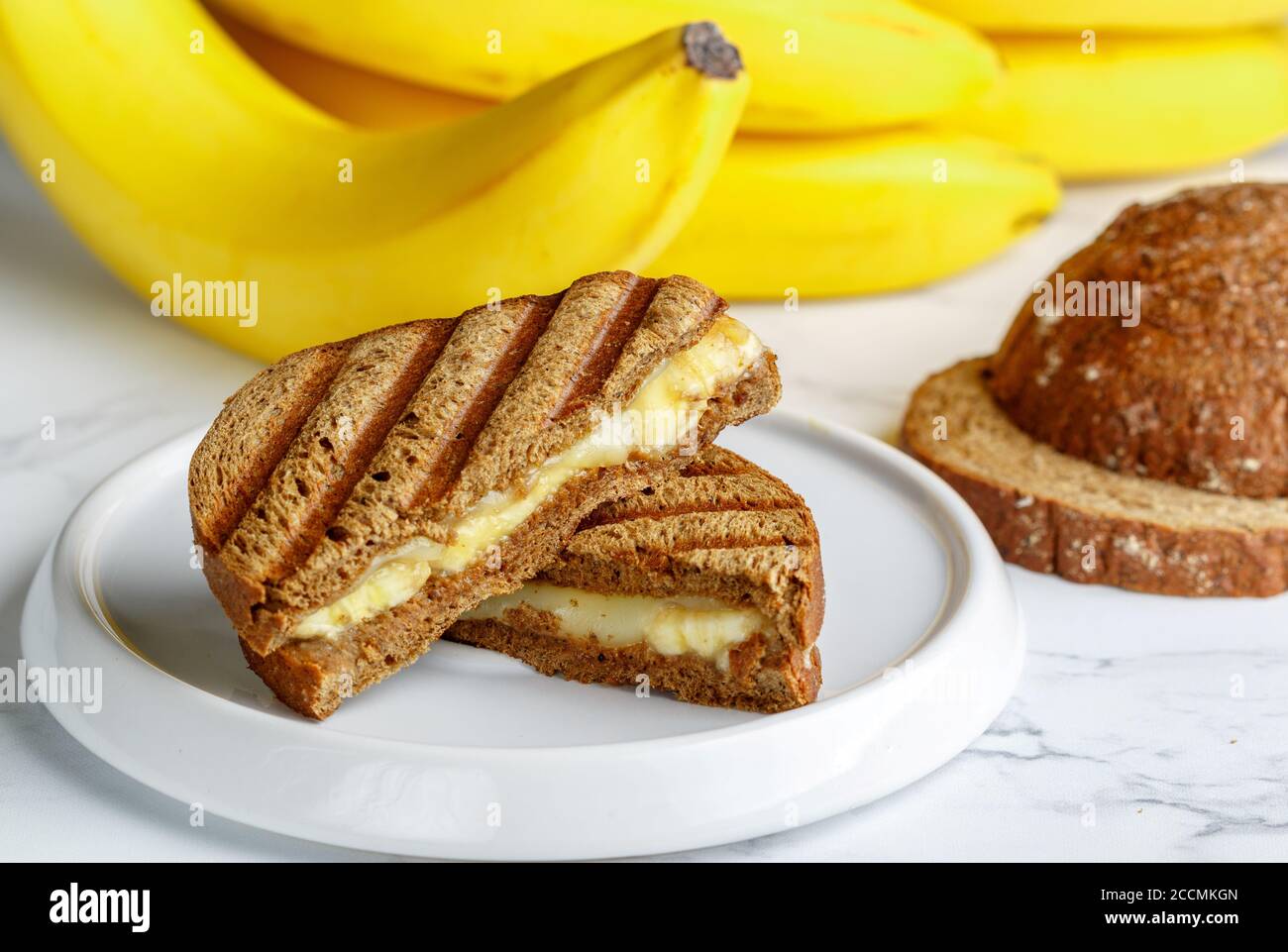 Grilled rye bread sandwich with banana and cream cheese. Delicious ...