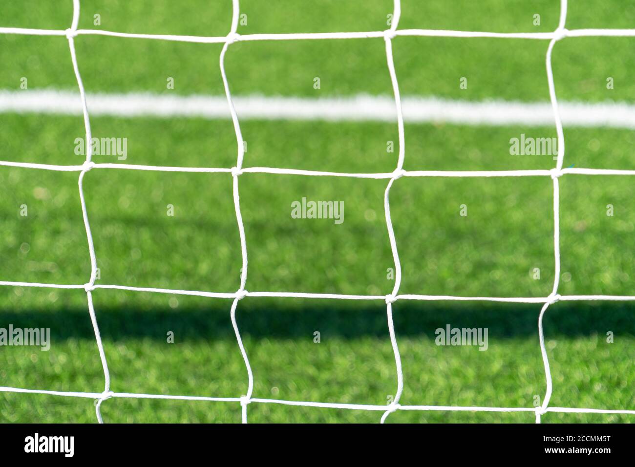 Close up of football soccer goal net with green grass background Stock ...