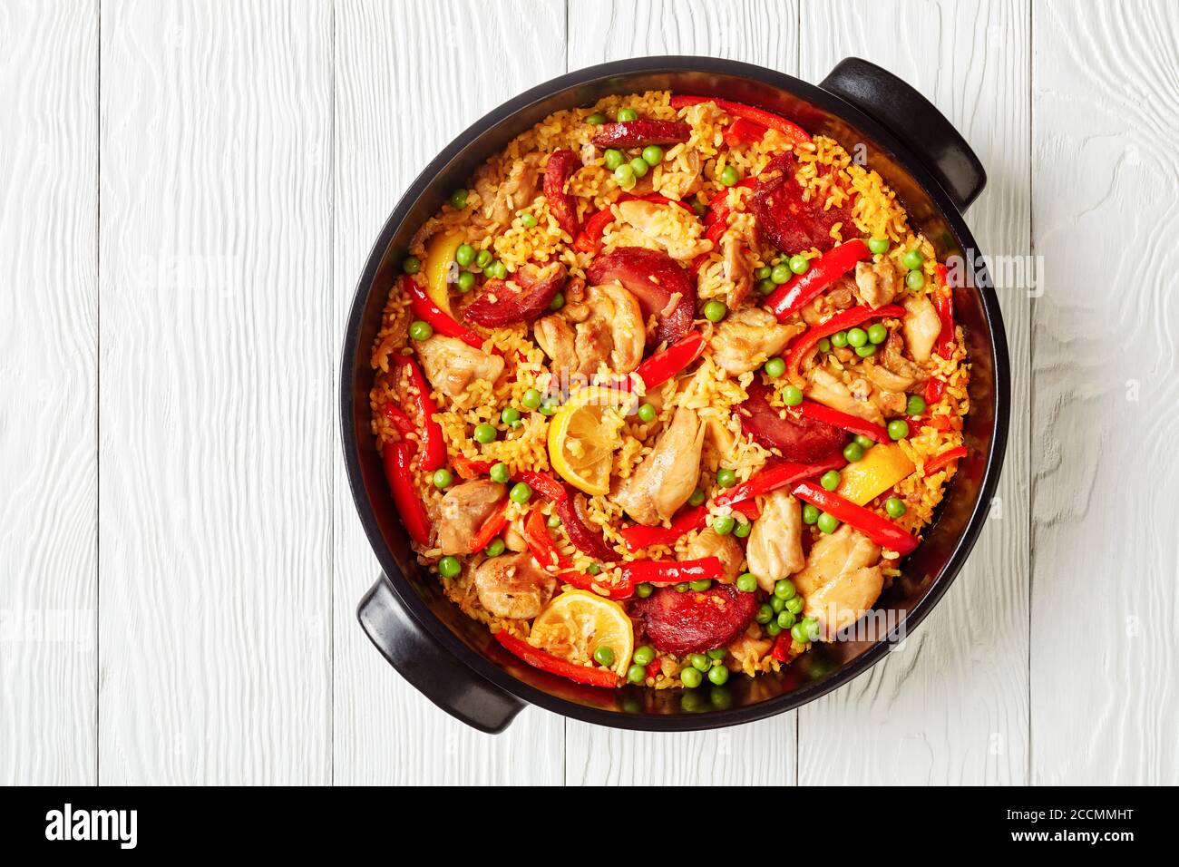 delicious spanish chicken paella with valencian bomba rice, chicken ...