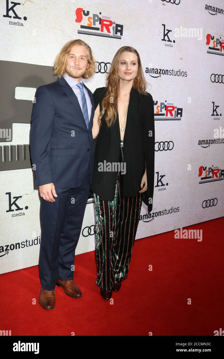 LOS ANGELES - OCT 24: Lou Taylor Pucci, Camille Kane at the Suspiria ...