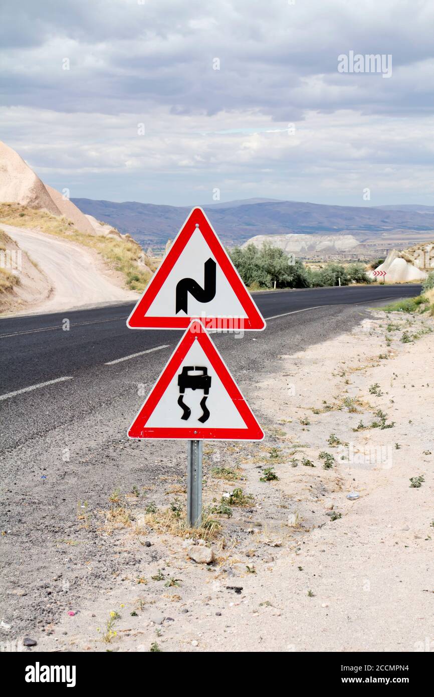 Double bend warning road sign hi-res stock photography and images - Alamy