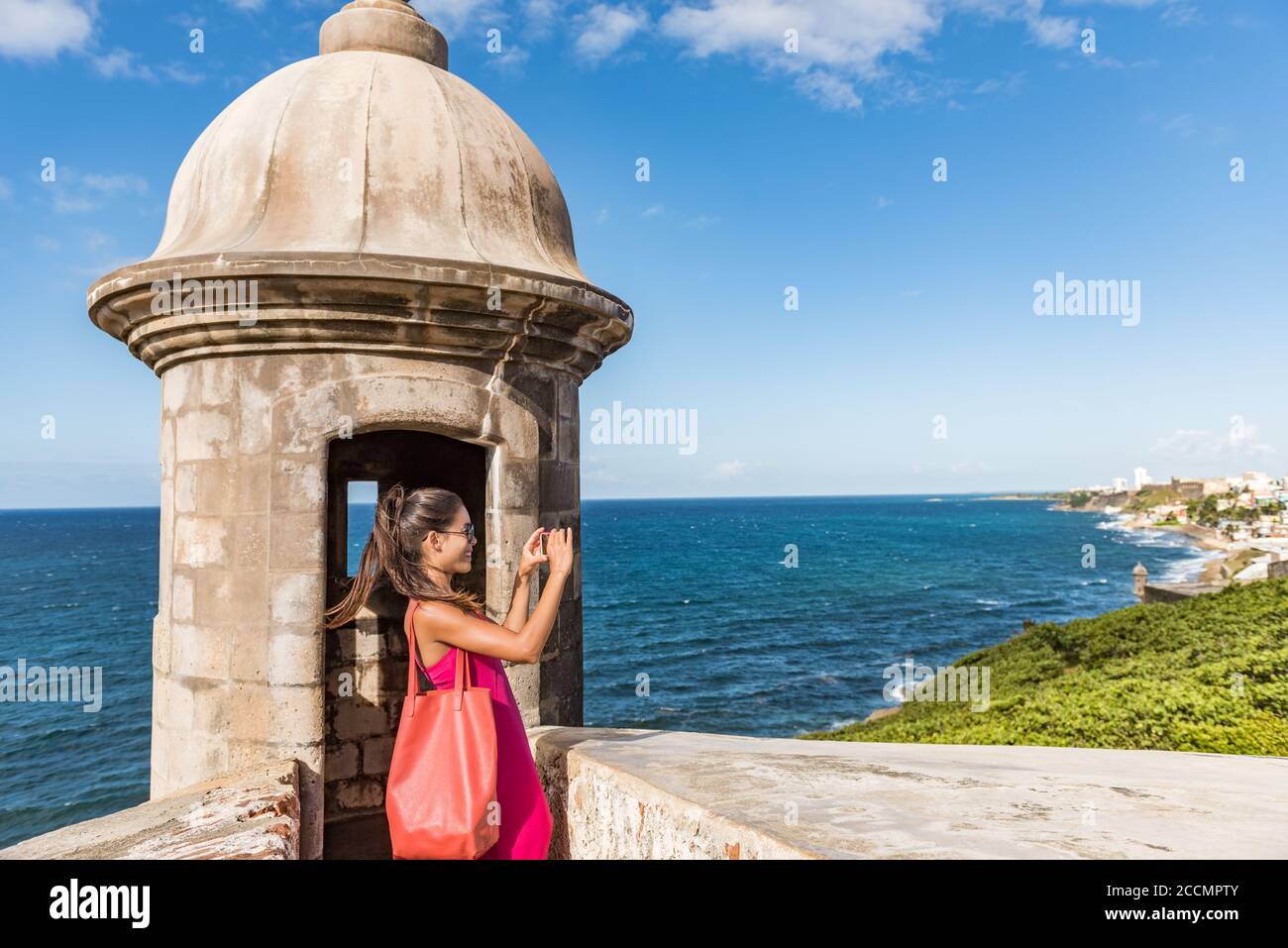 Puerto Rico San Juan woman taking phone pictures of Old San Juan Fort ...