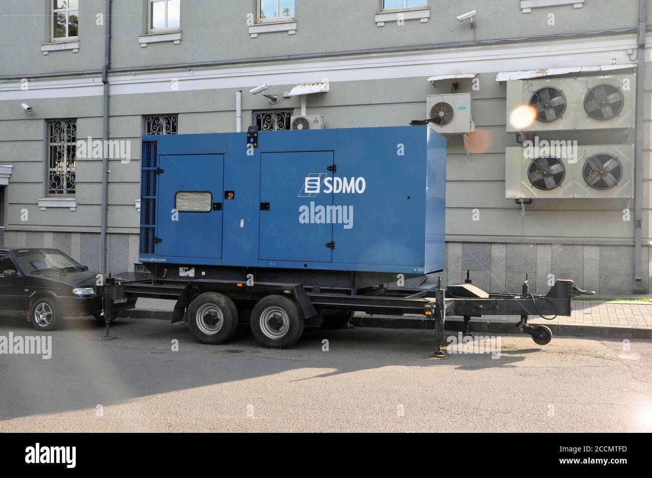 Blue standby mobile diesel generator for office building Stock Photo ...