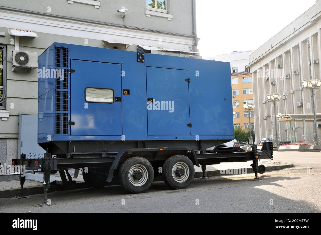 Blue standby mobile diesel generator for office building Stock Photo ...