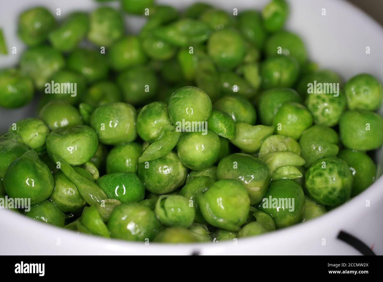 Closeup shot of green pea beans in the bowl Stock Photo - Alamy