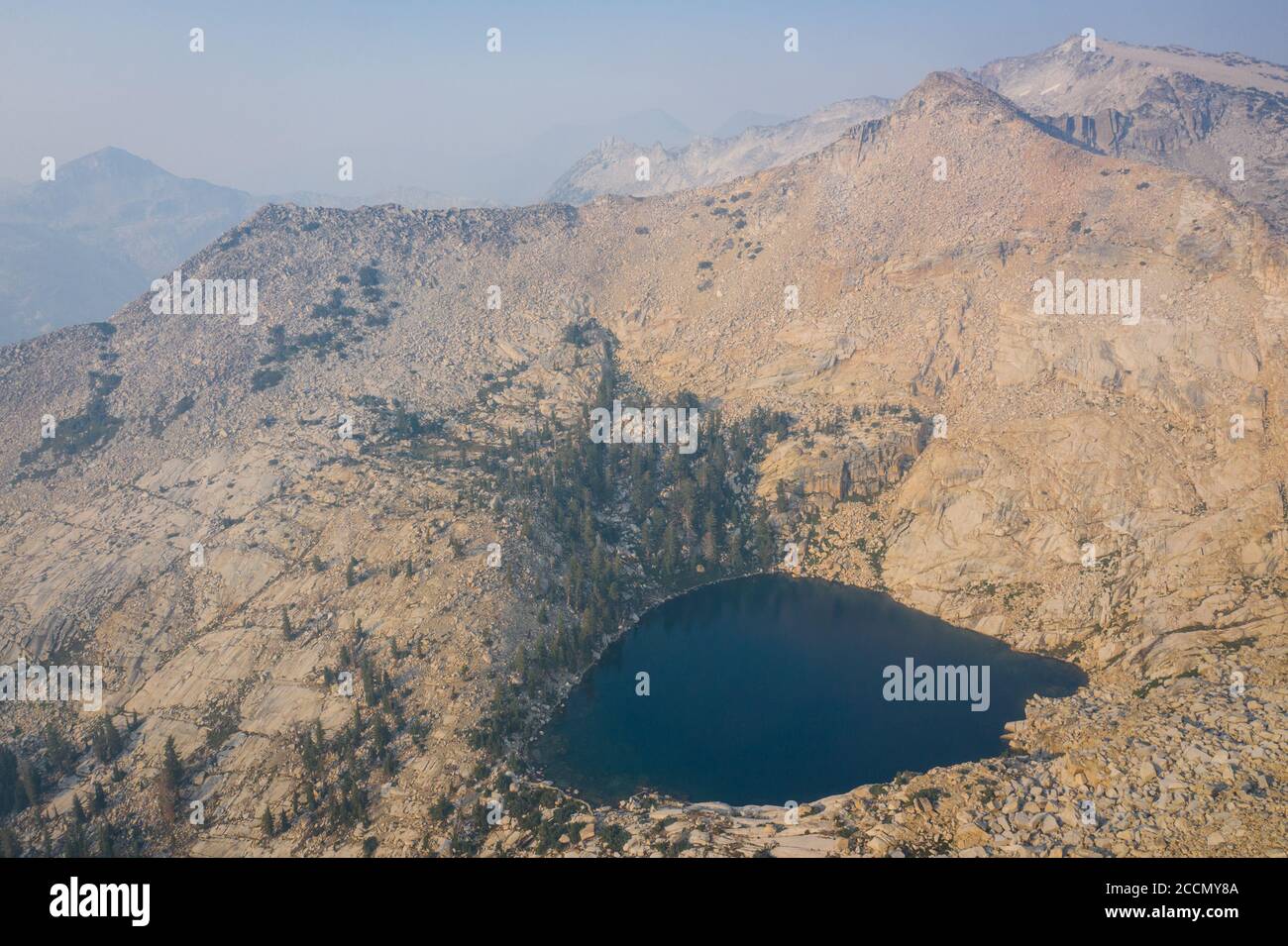 A scenic lake is found amid the wilderness of the Sierra Nevada ...