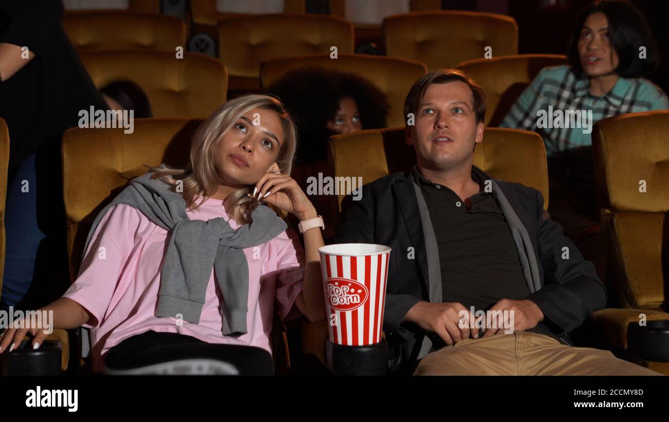 Walking to seats movie theater hi-res stock photography and images - Alamy
