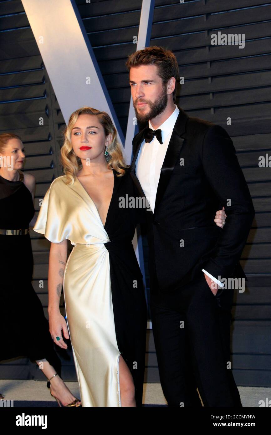 LOS ANGELES - MAR 4: Miley Cyrus, Liam Hemsworth at the 24th Vanity ...