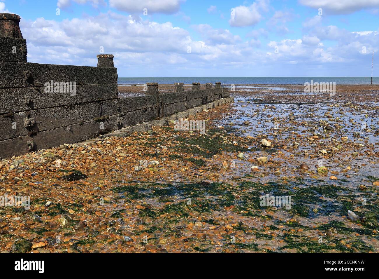 A view looking along the Wooden Groyne on the beach at Whitstable Stock ...