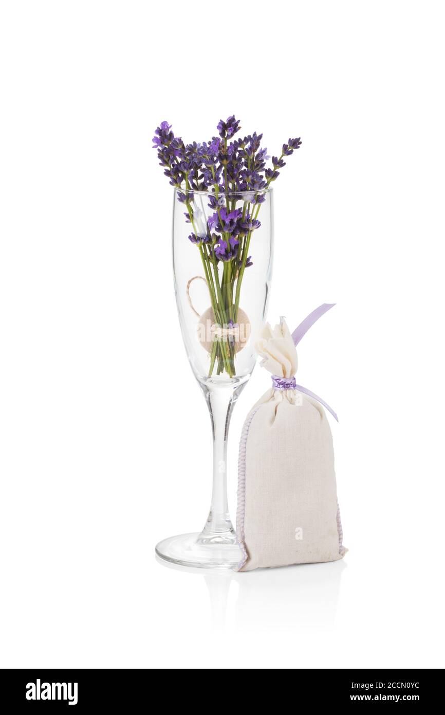 Aromatic lavender bouquet in champagne glass isolated on white ...