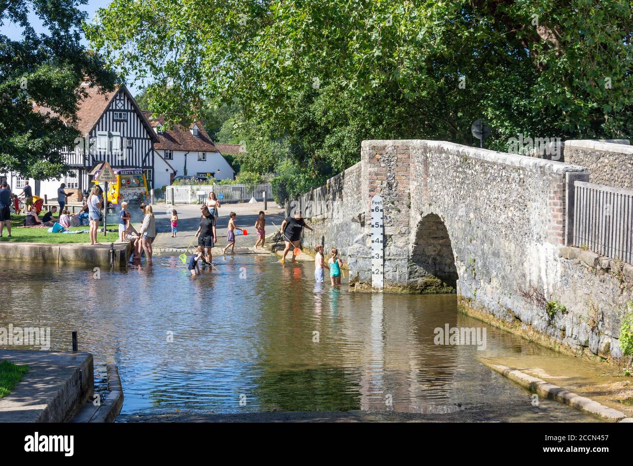 Children playing in the ford on River Darent, Riverside, Eynsford, Kent ...