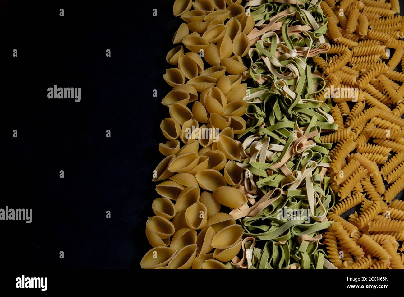 Variety of types and shapes of dry Italian pasta. Italian Macaroni raw ...