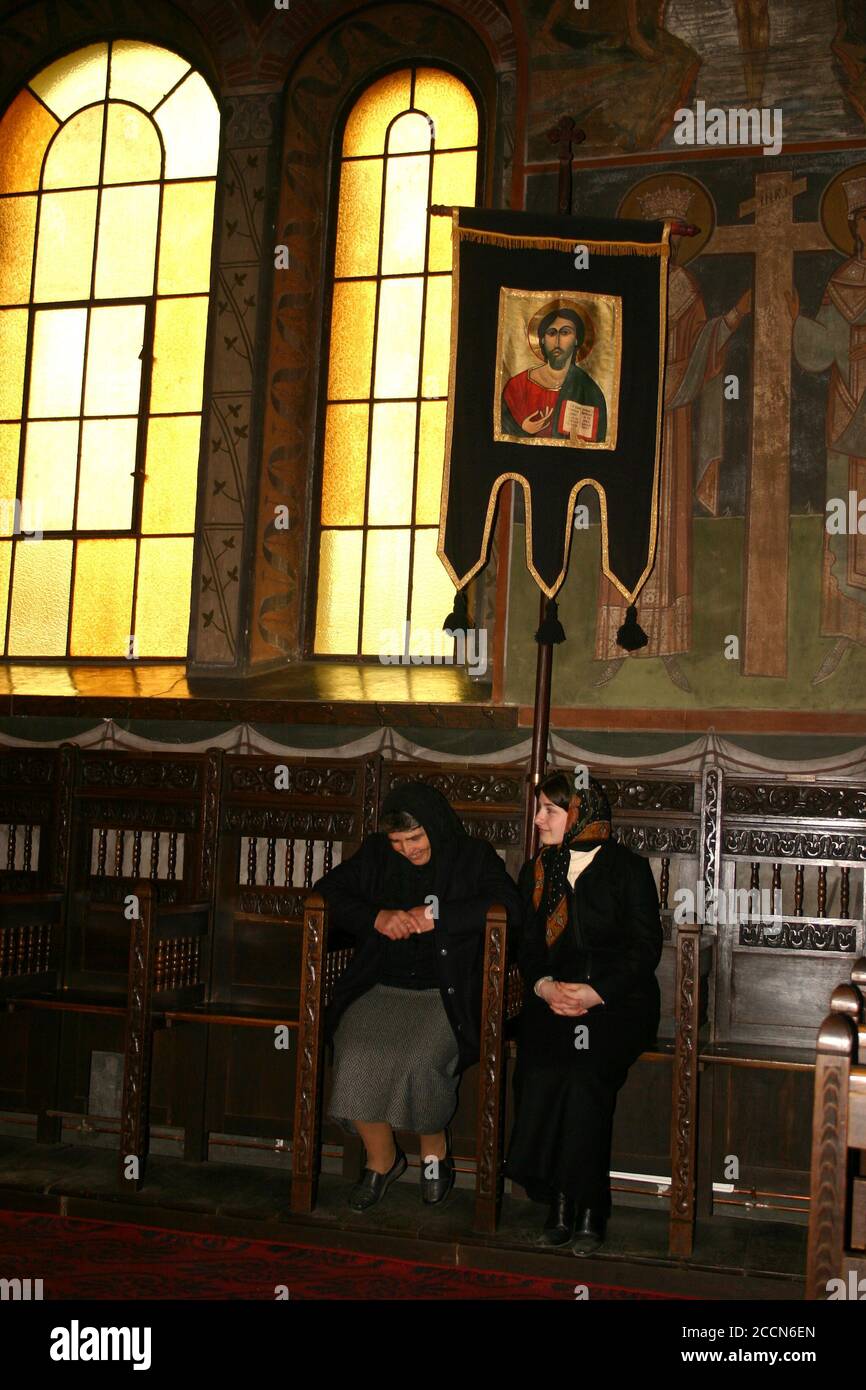 Women inside a Christian Orthodox church in Romania Stock Photo - Alamy