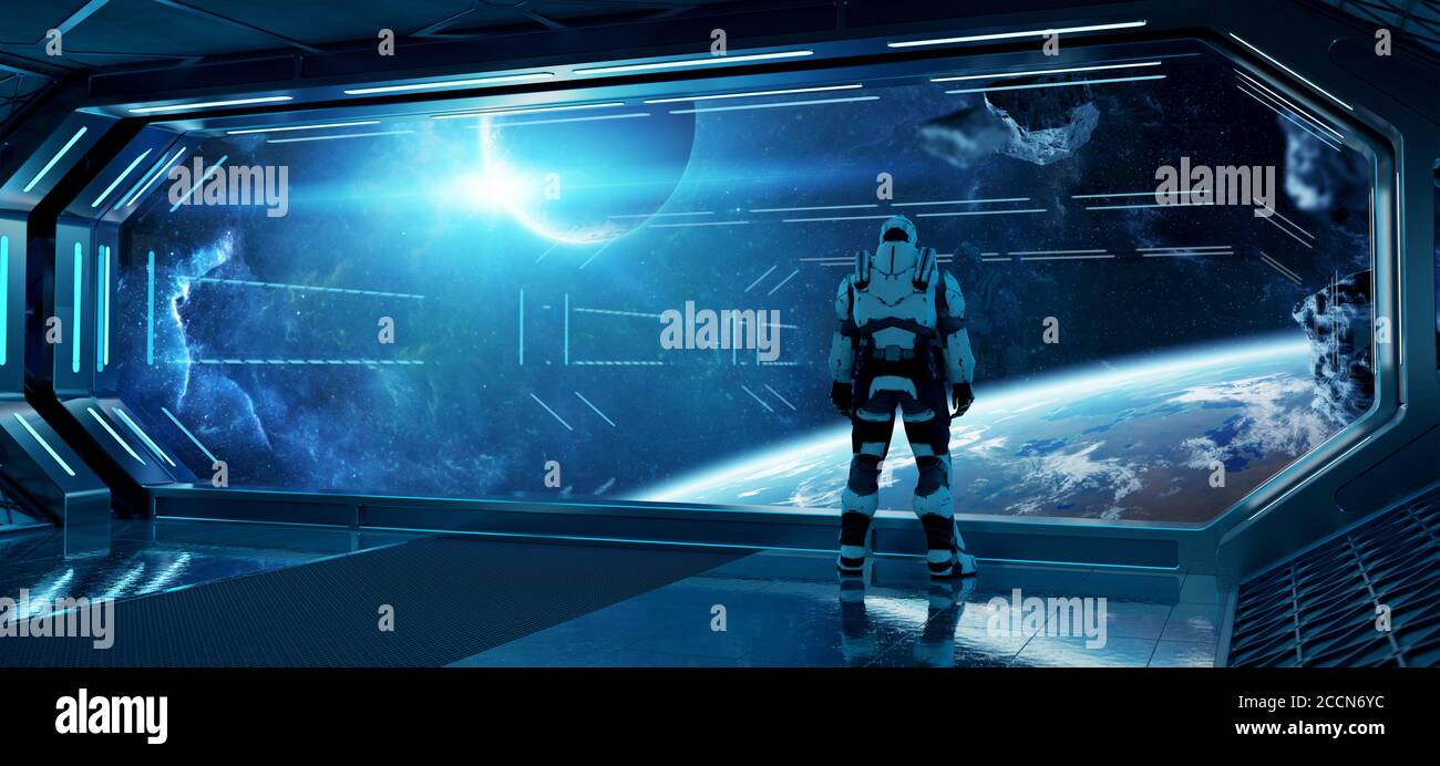 Astronaut in futuristic blue spaceship watching space through a large ...