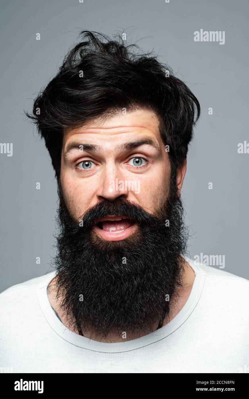 Funny face. Surprised handsome man. Shocked male model with surprise ...