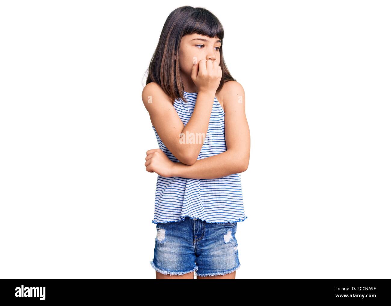 Young little girl with bang wearing casual clothes looking stressed and ...