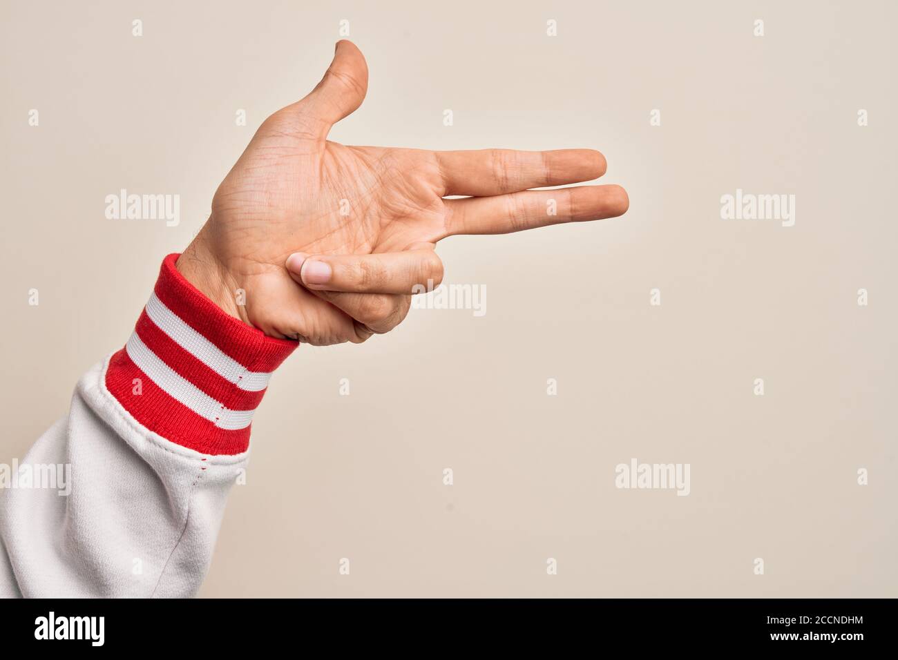 Hand of caucasian young man showing fingers over isolated white ...